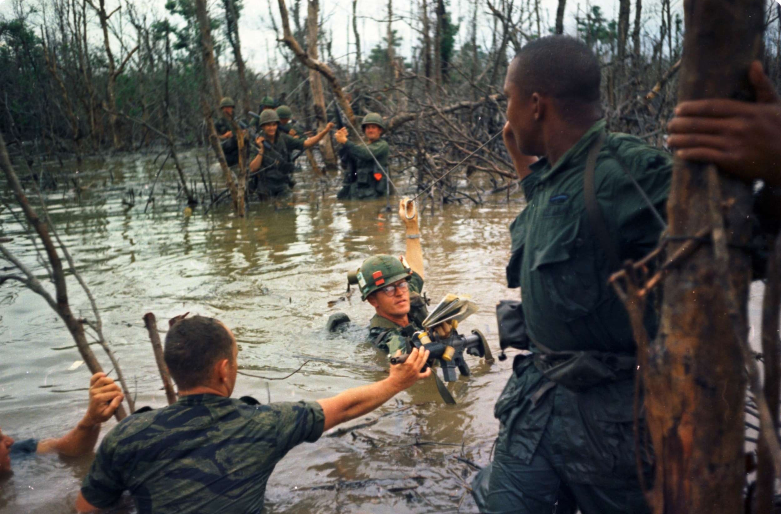 Soldiers Keeping Their Heads and Weapons Above Water in the 'Killer ...