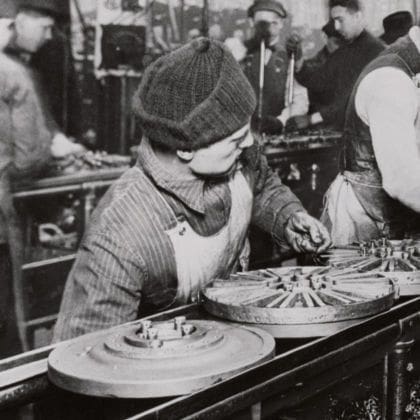 Photograph of Workers on the First Moving Assembly Line - DocsTeach