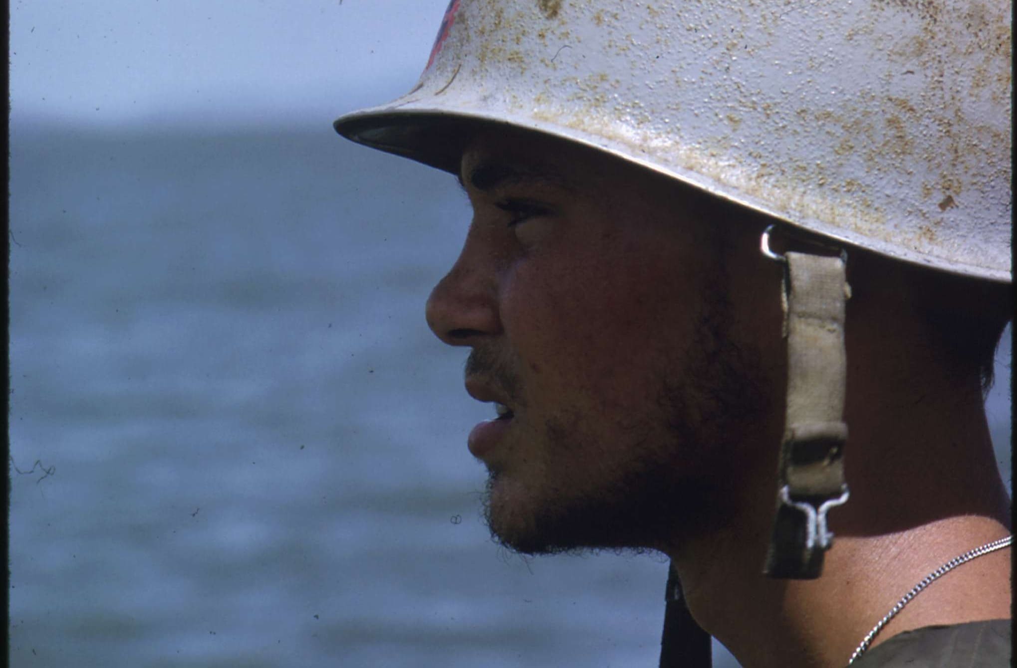 A Navy Gunner Mans his 50 Caliber Machine Gun on Utility Boat as it ...
