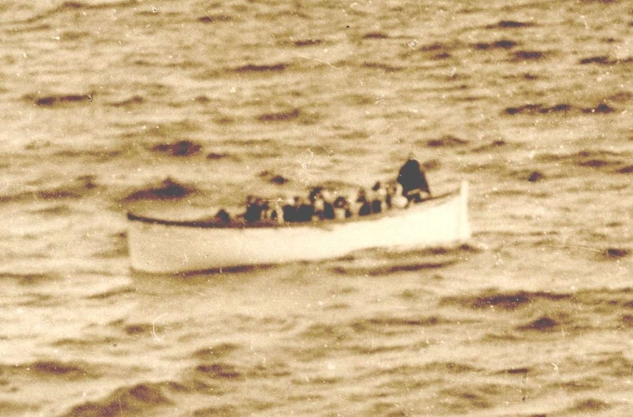 Uncaptioned Photograph of Titanic Survivors in a Lifeboat After the ...