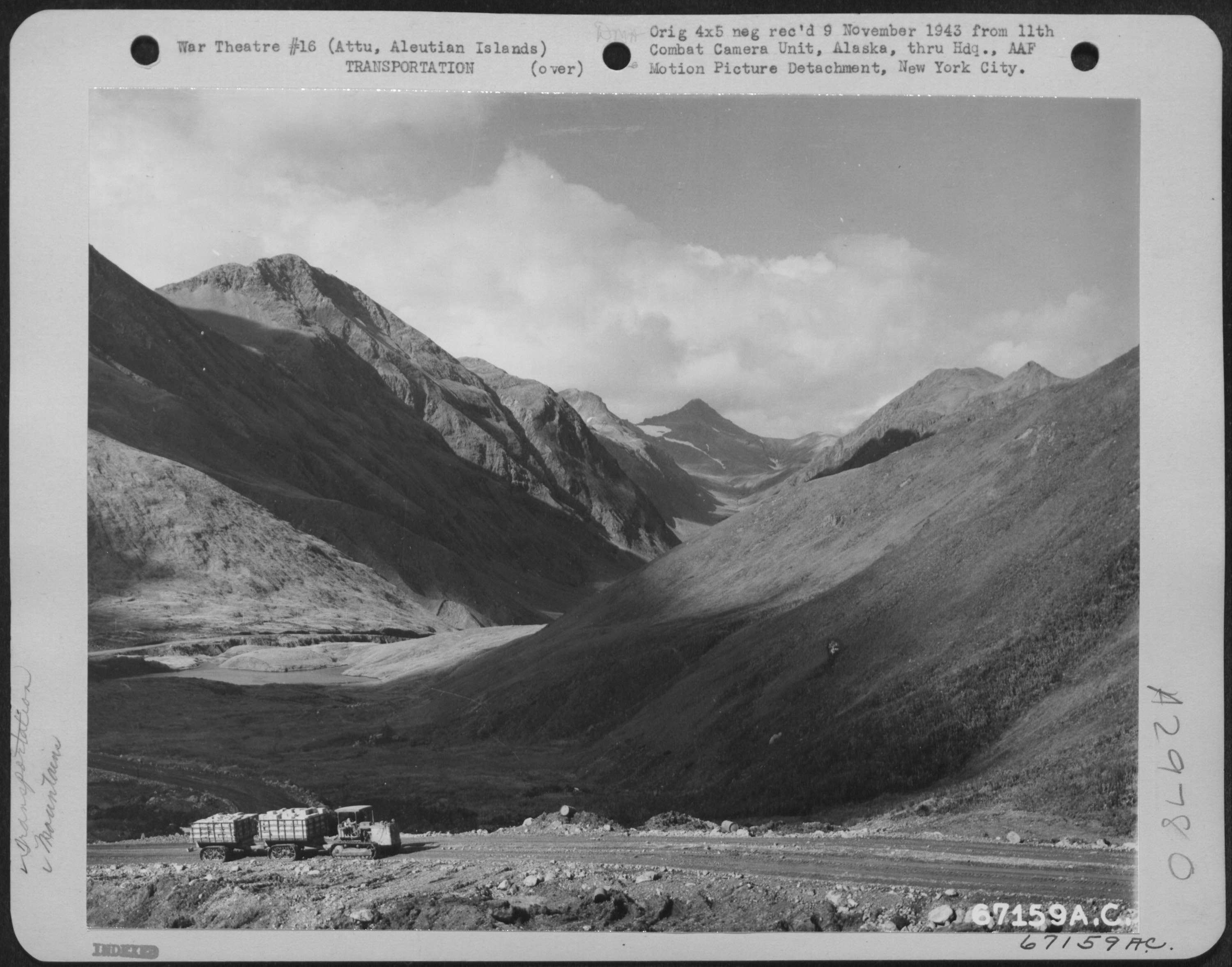 Supplies are hauled along a scenic mountainous road to the Alexai Point ...