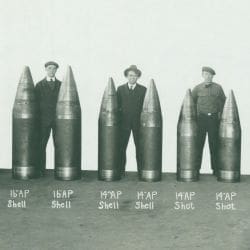 Workmen Displaying Various Types and Sizes of World War I Era Shells ...