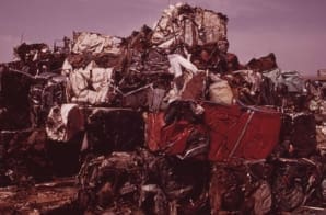 Flattened Autos Are Ready For Recycling At Auto Scrap Yard - DocsTeach